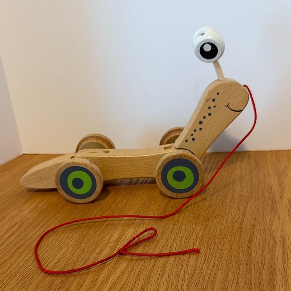 Hape | Toys | Hape Wooden Snail Pull Toy With Green Accents | Poshmark